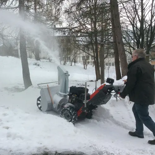 Pedestrian Snow Blower